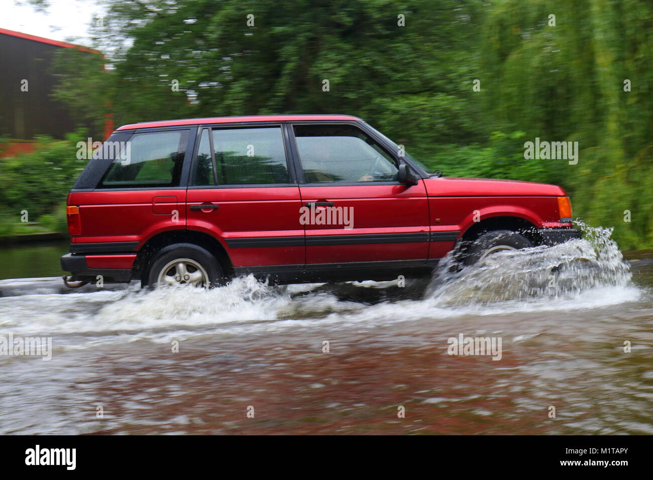 Driving Through A Ford Stock Photos & Driving Through A Ford Stock ...