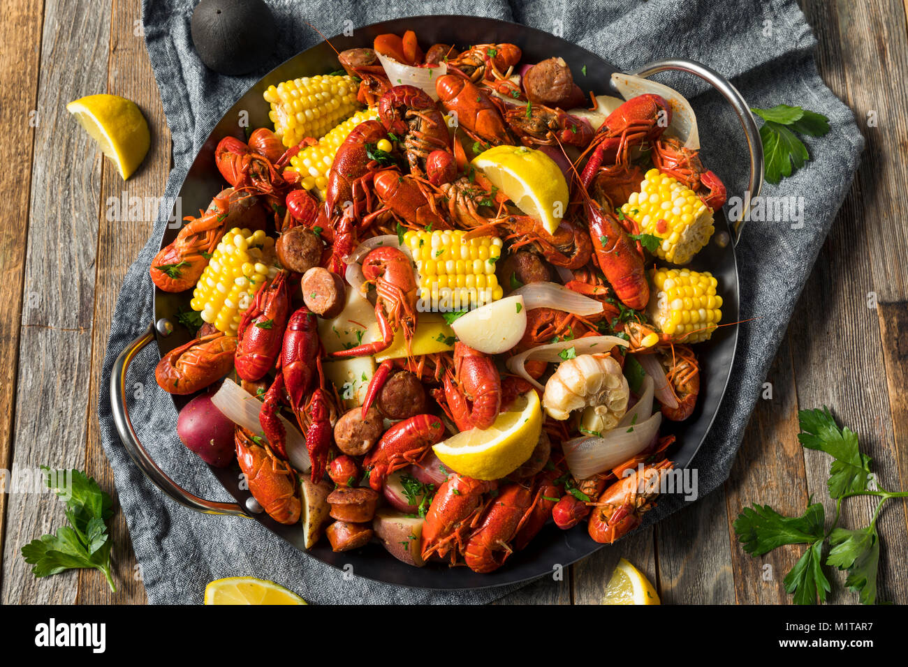 Homemade Southern Crawfish Boil with Potatoes Sausage and Corn Stock ...