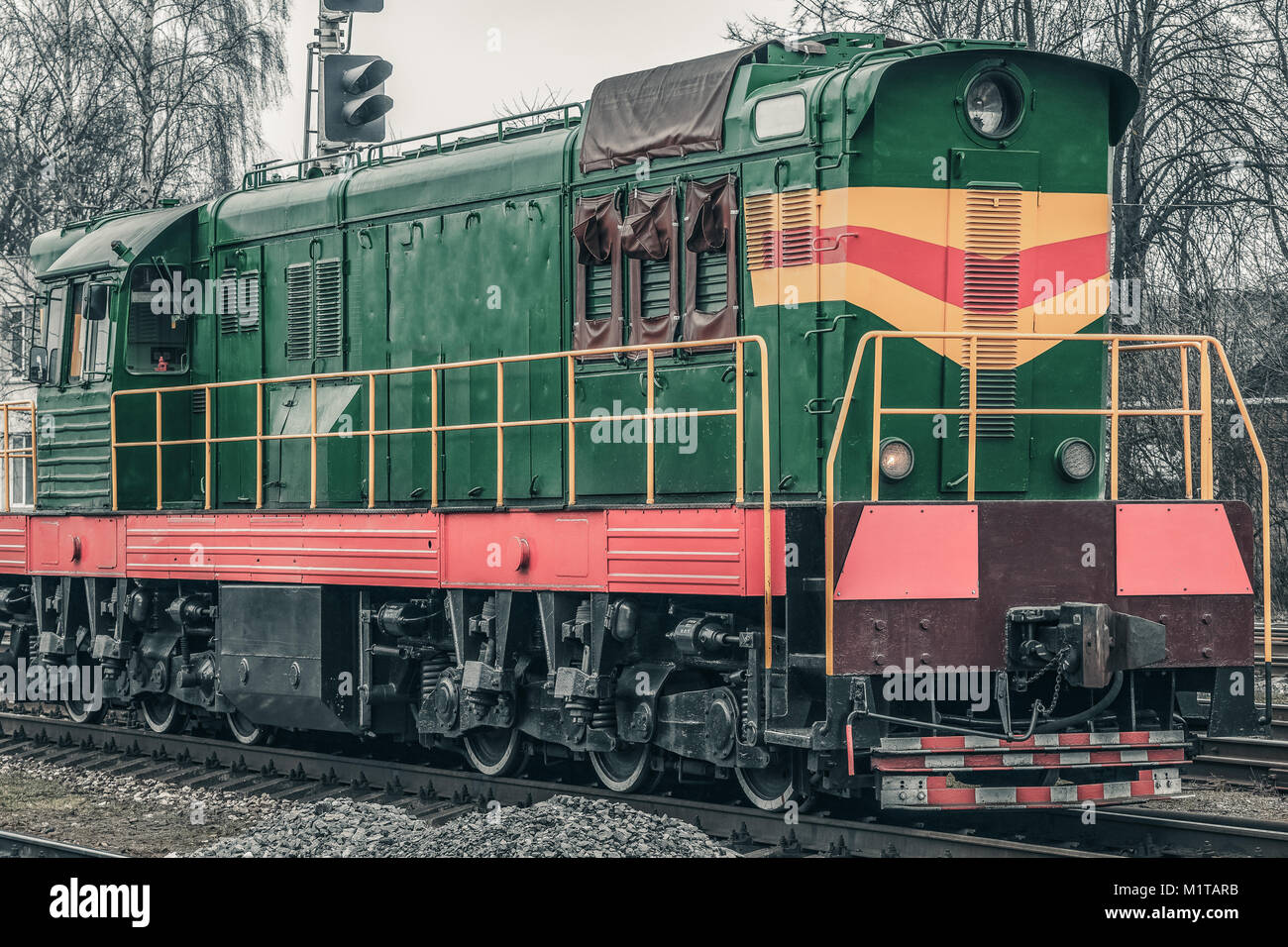 Green diesel cargo locomotive. Freight train in action Stock Photo - Alamy