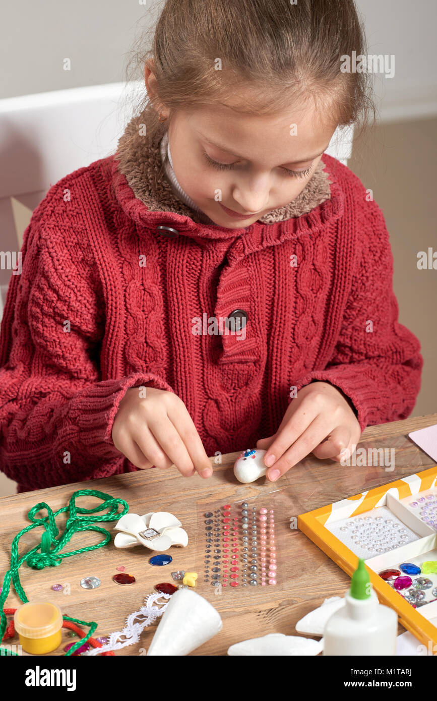 Children make crafts and toys, handmade concept. Artwork workplace with ...