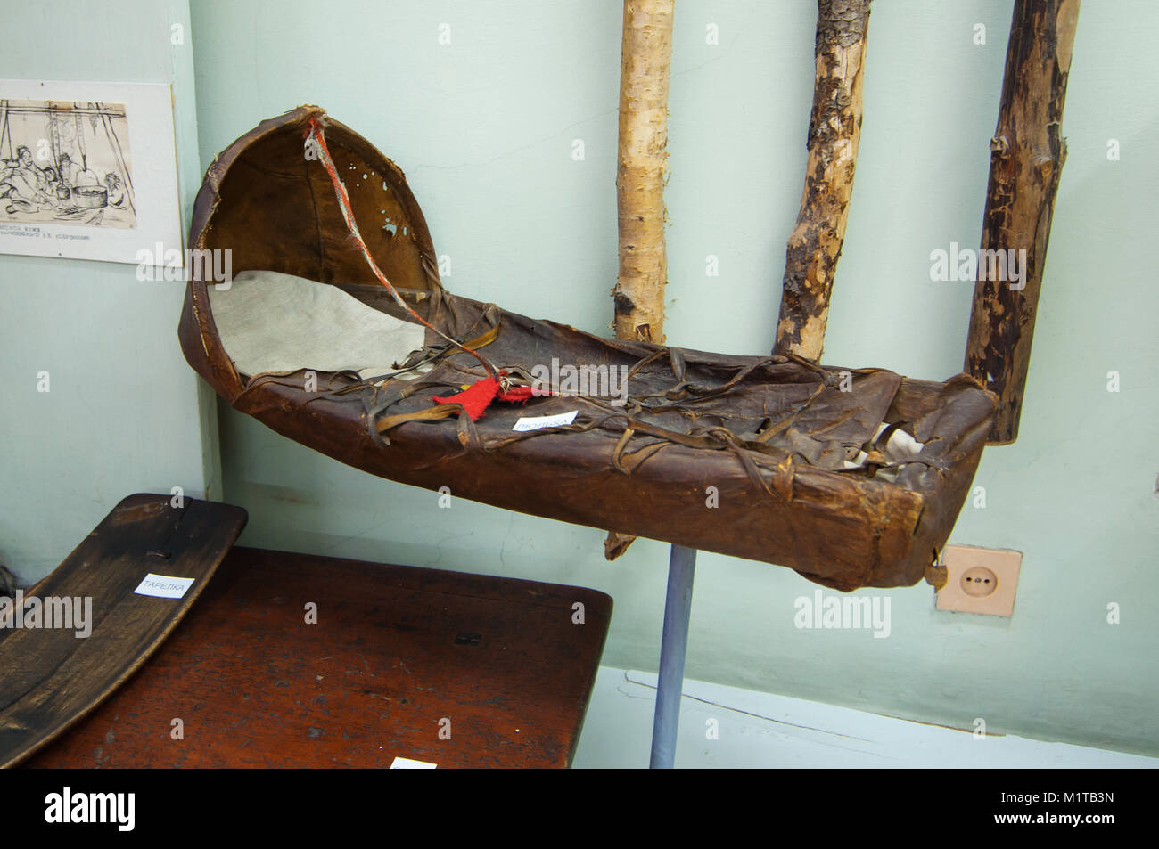 Baby cradle - the subject of the Sami way of life Stock Photo - Alamy
