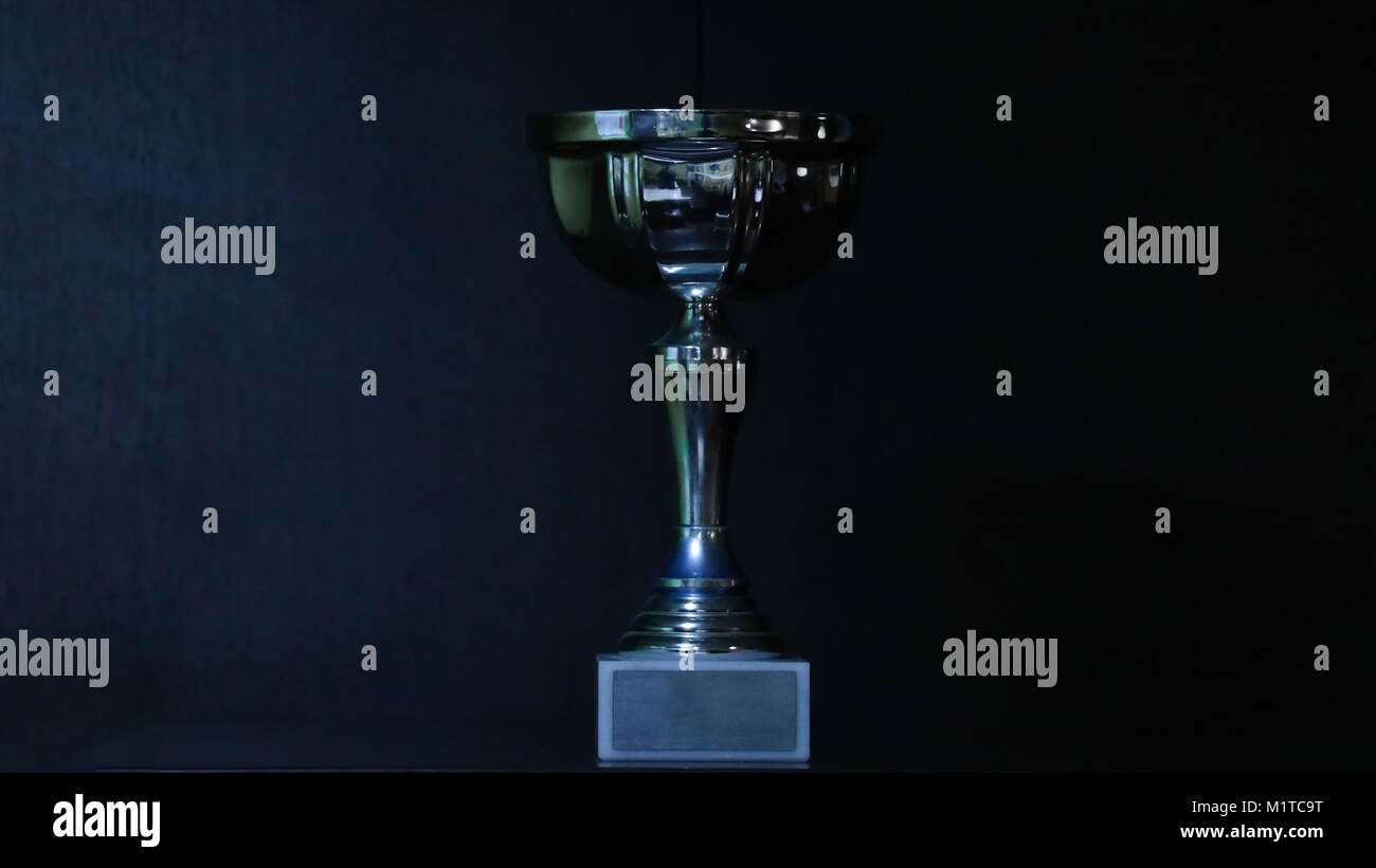 Winning prize cup blank on the table Stock Photo - Alamy