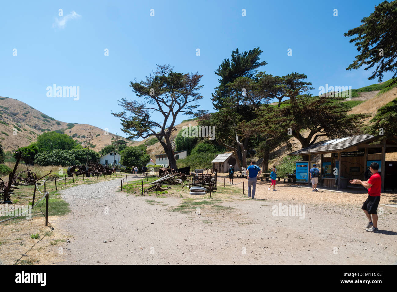 Visitors approach the former Scorpion Ranch, which is now the primary ...