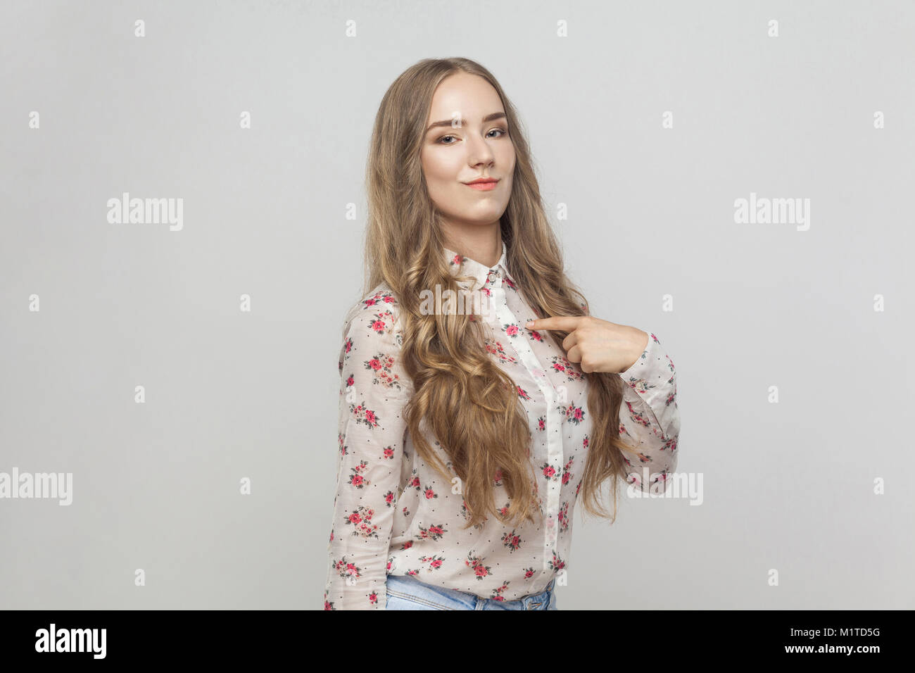 I'm first and better you! Proud woman pointing finger himself and ...