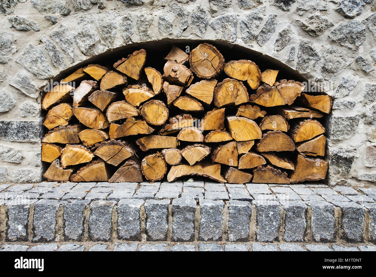 stone fireplace with firewood without fire Stock Photo - Alamy