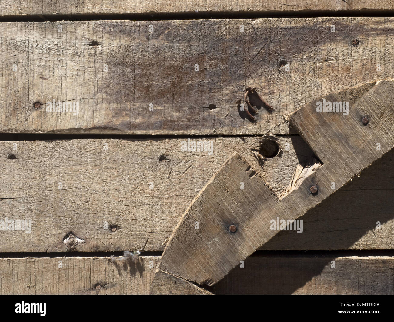Grunge texture of a wooden background of rough planks joined together ...