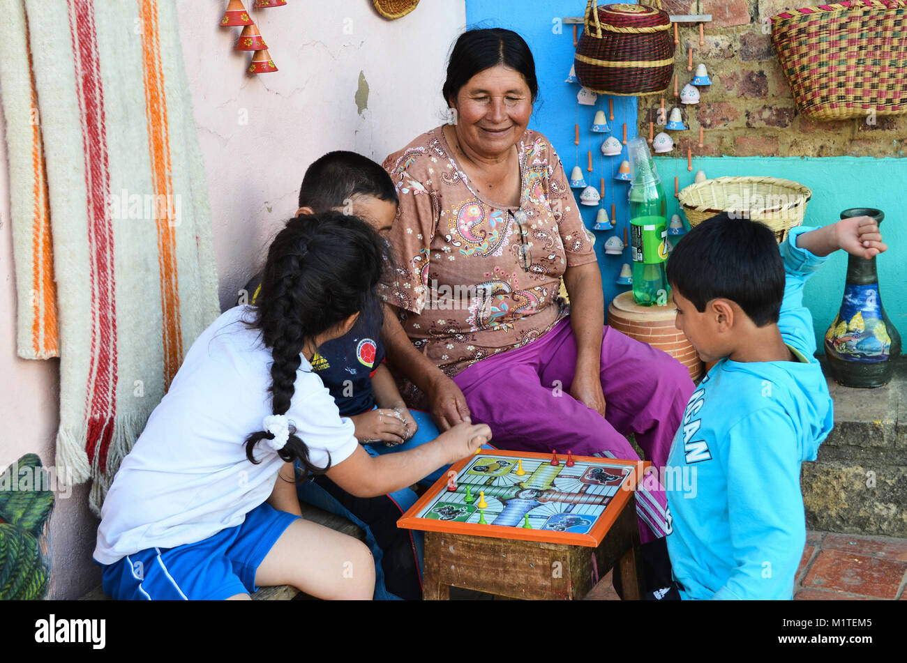 BOYACA, COLOMBIA - JANUARY 23, 2014: A humble family having some fun on ...