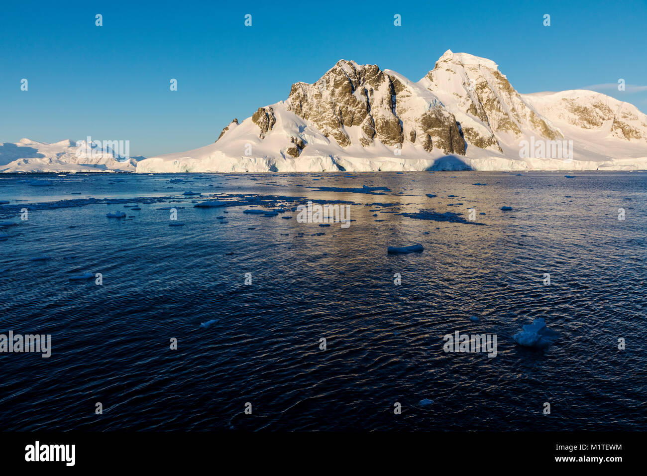 Sea ice & snow covered Antarctica landscape; Rongé Island; Arctowski ...