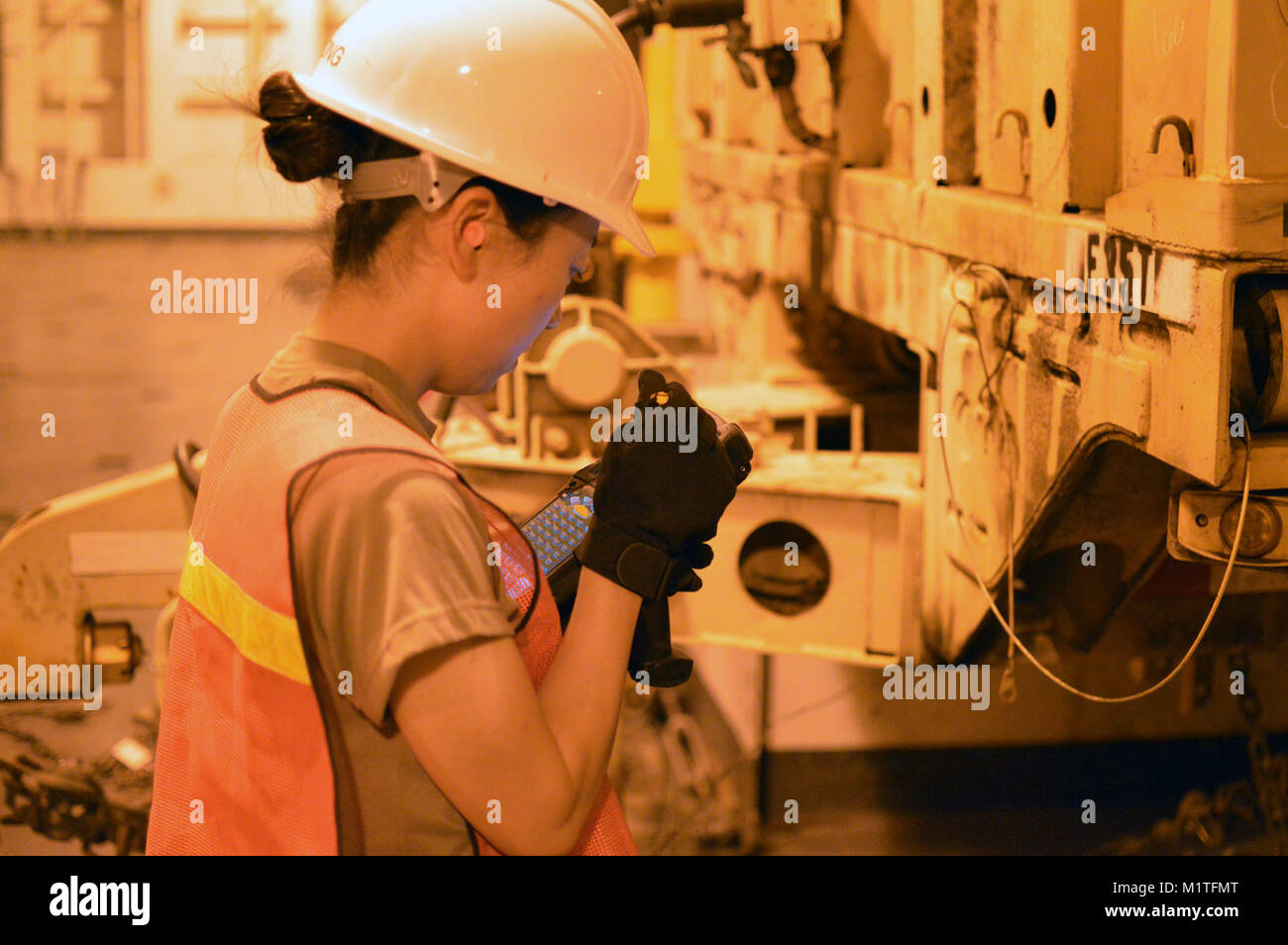 Spc. Giyun Song, a cargo specialist assigned to the 502nd Expeditionary ...