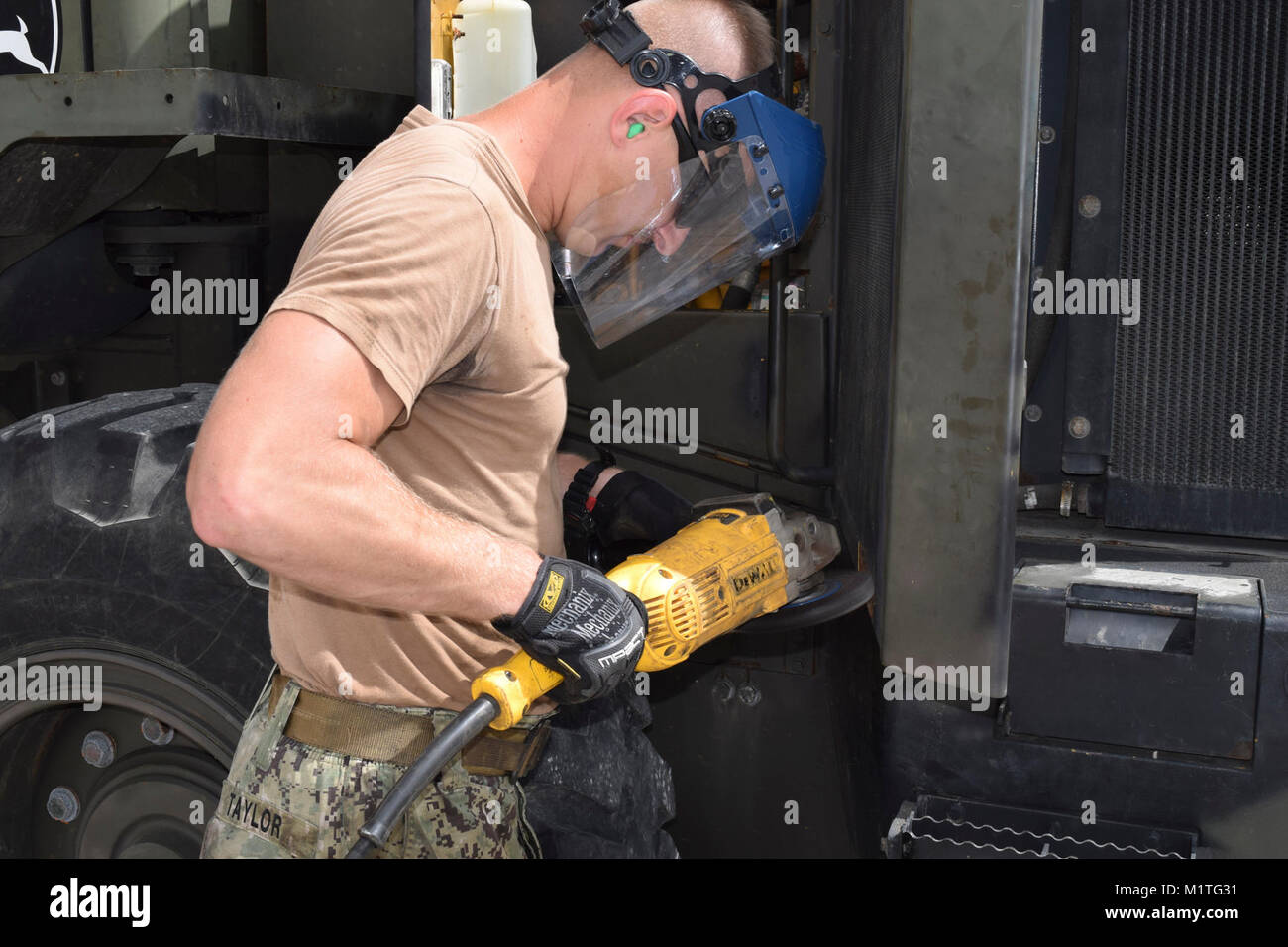 CAMP COVINGTON, Guam (Jan. 25, 2018) Construction Mechanic 3rd Class ...