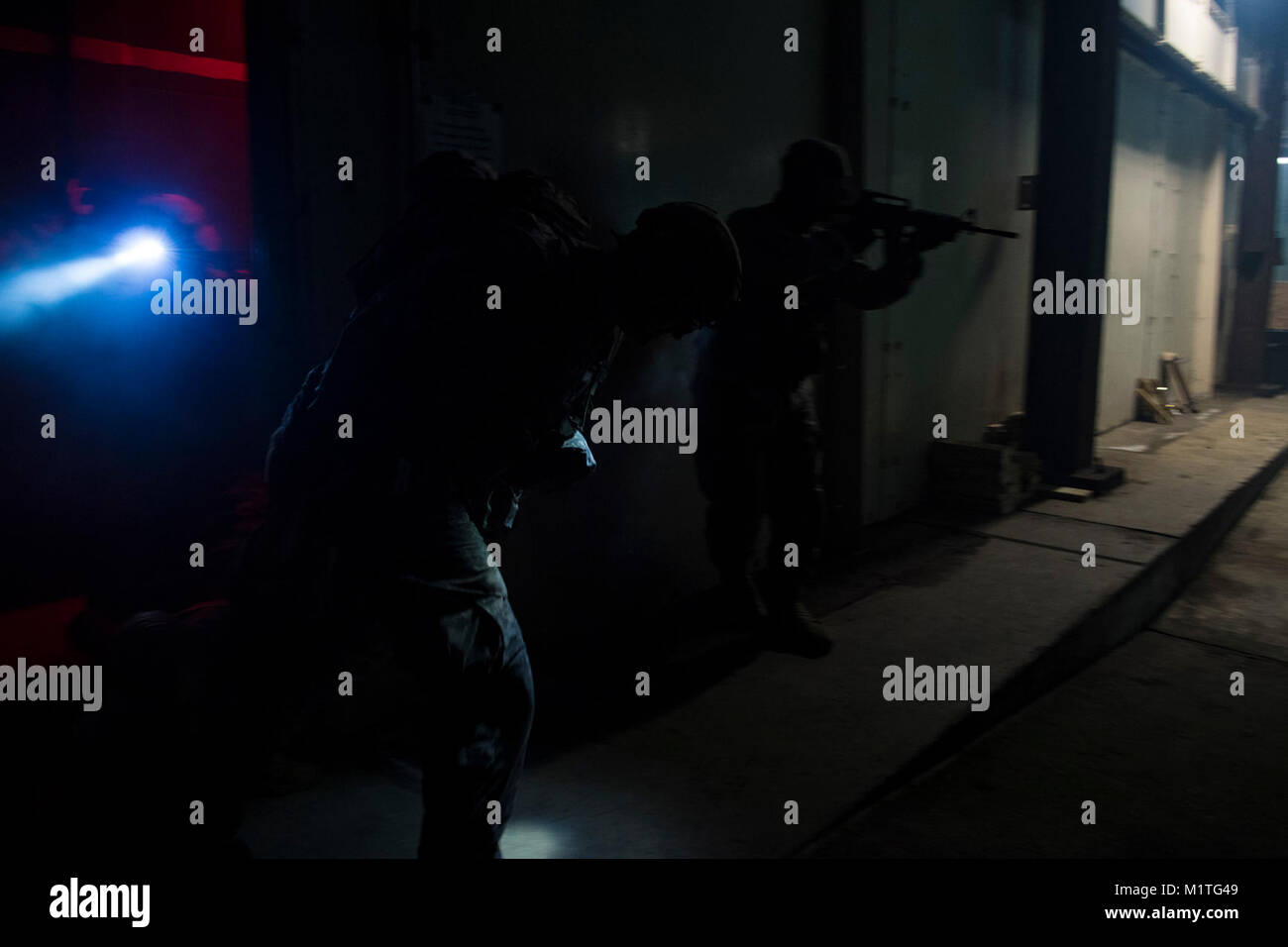 U.S. Army combat medics with the West Virginia Army National Guard drag ...