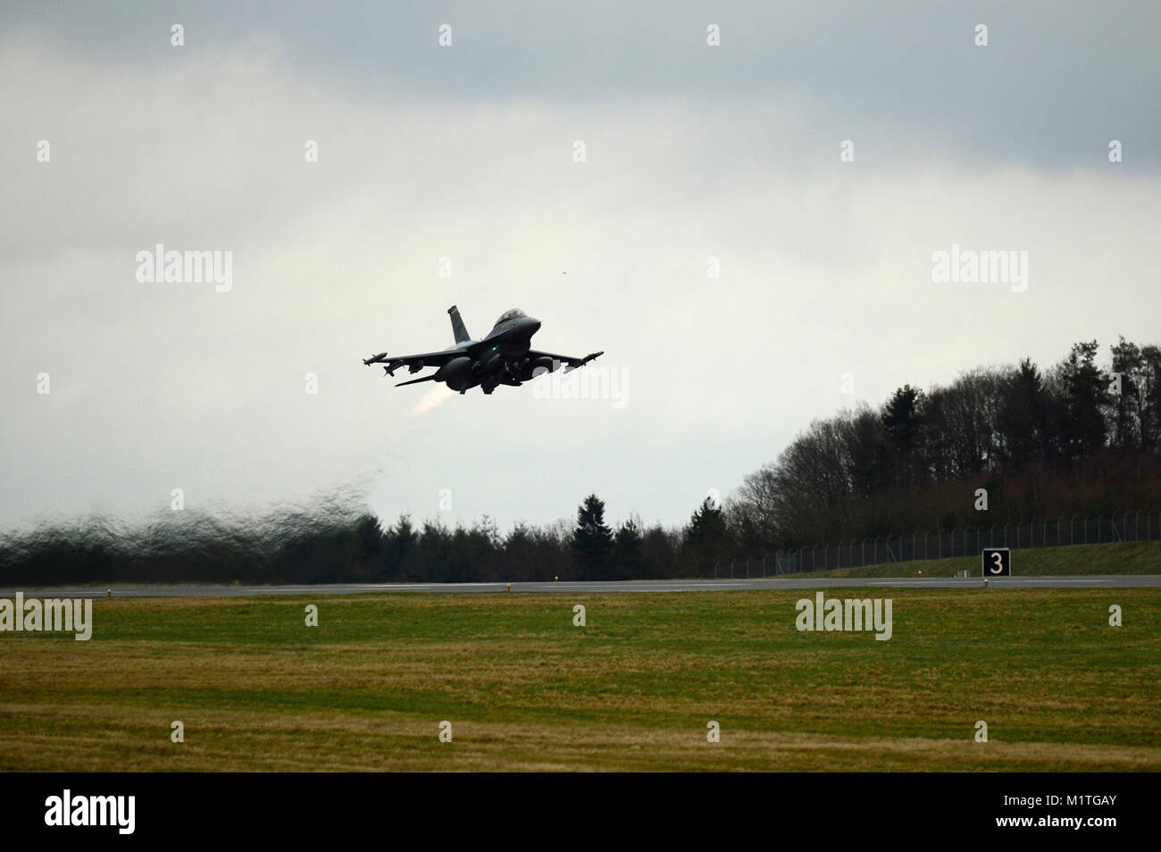 An F-16 Fighting Falcon takes off from the flightline here Jan. 29 ...