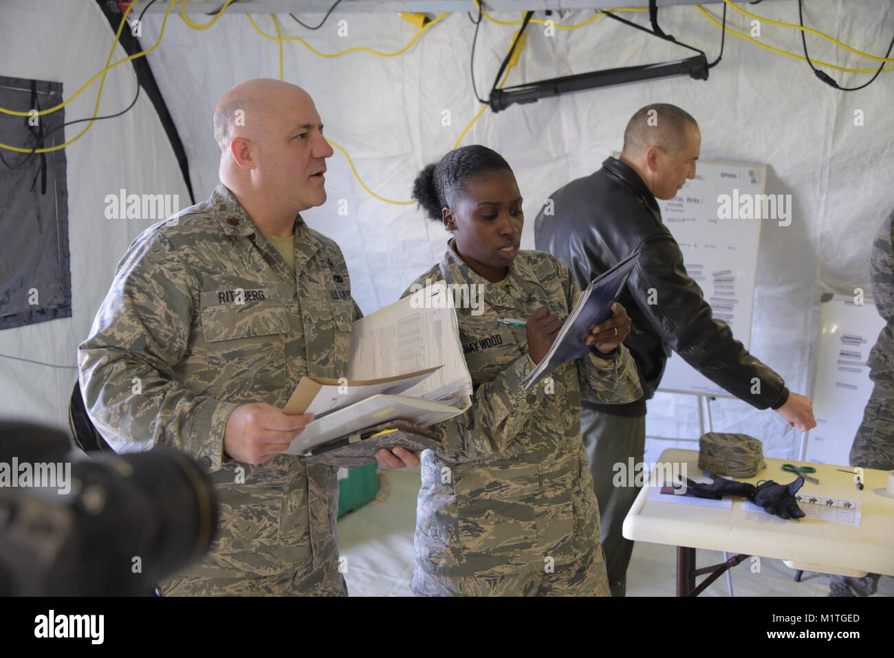 Maj. Marc Rittberg (Left), 60th Medical Support Squadron, addresses ...