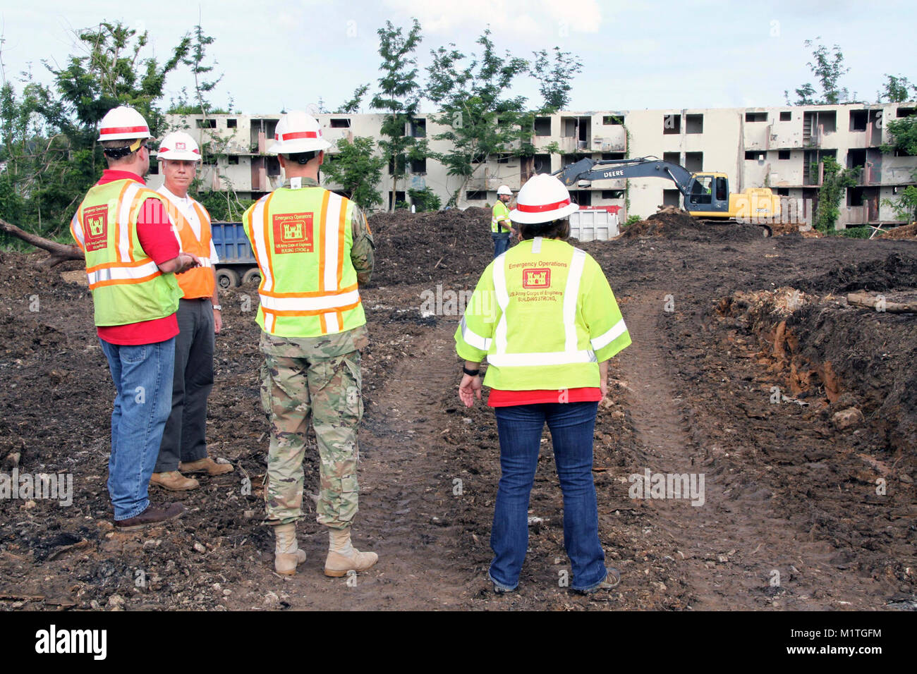 Peter Gibson (far left), zone engineer for debris management in the San ...