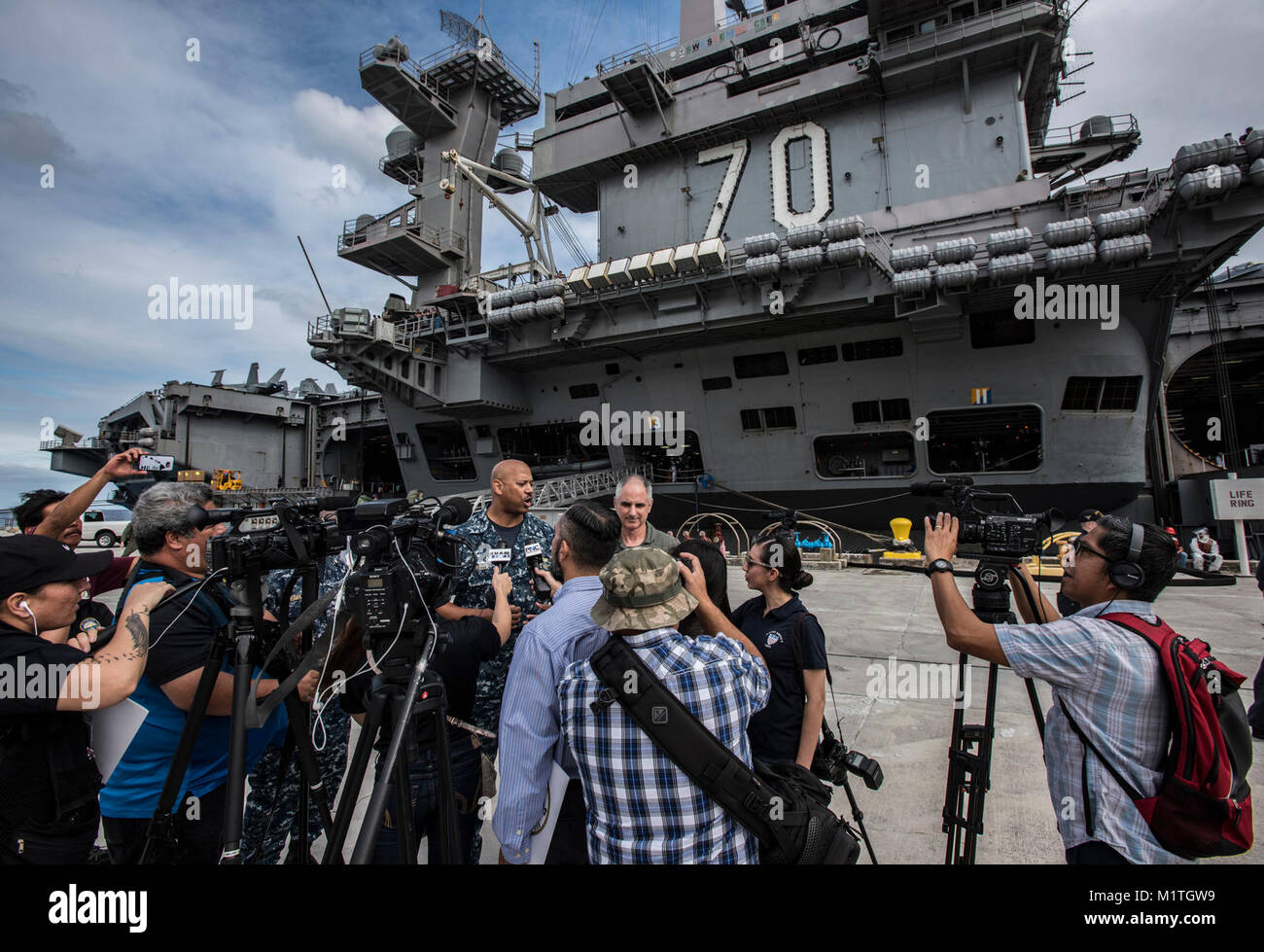 SANTA RITA, Guam (Jan. 31, 2018) Rear Adm. John Fuller, commander ...