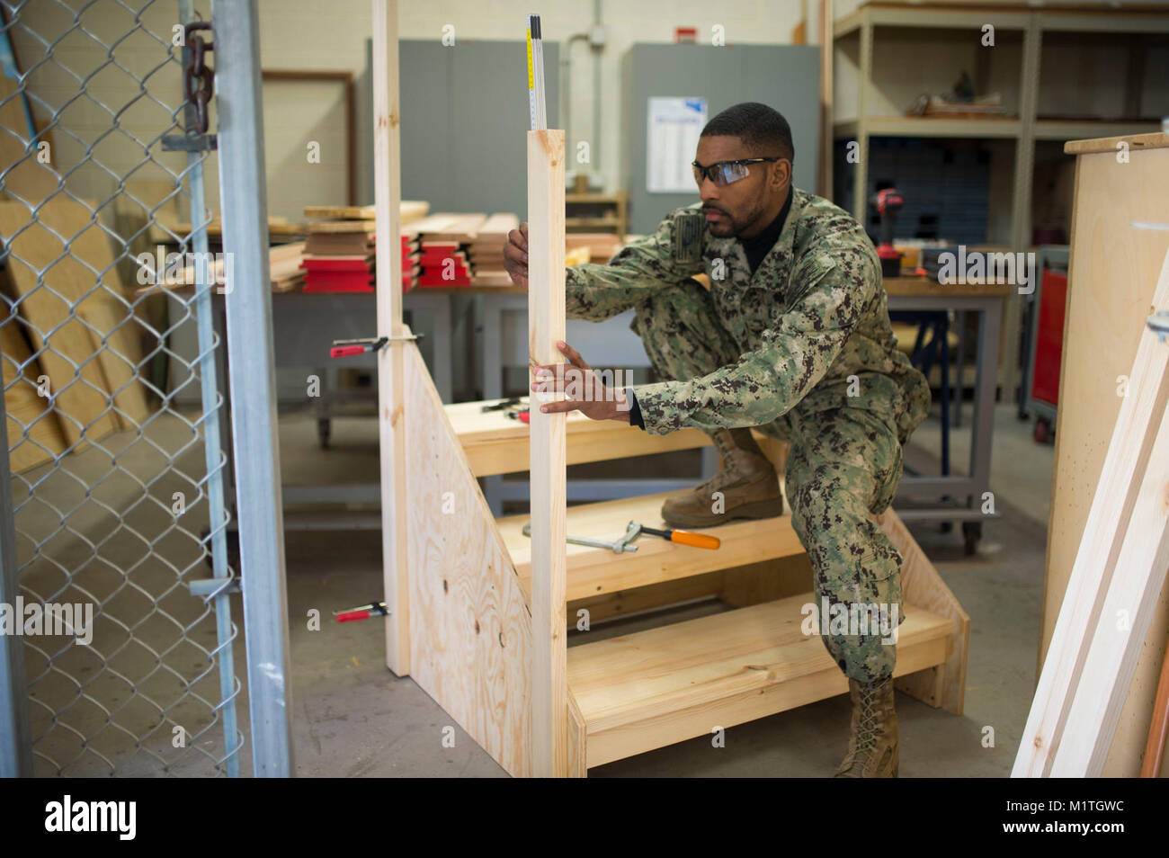 SIGONELLA, Sicily (January 31, 2018) Builder 2nd Class Creadell Burns ...