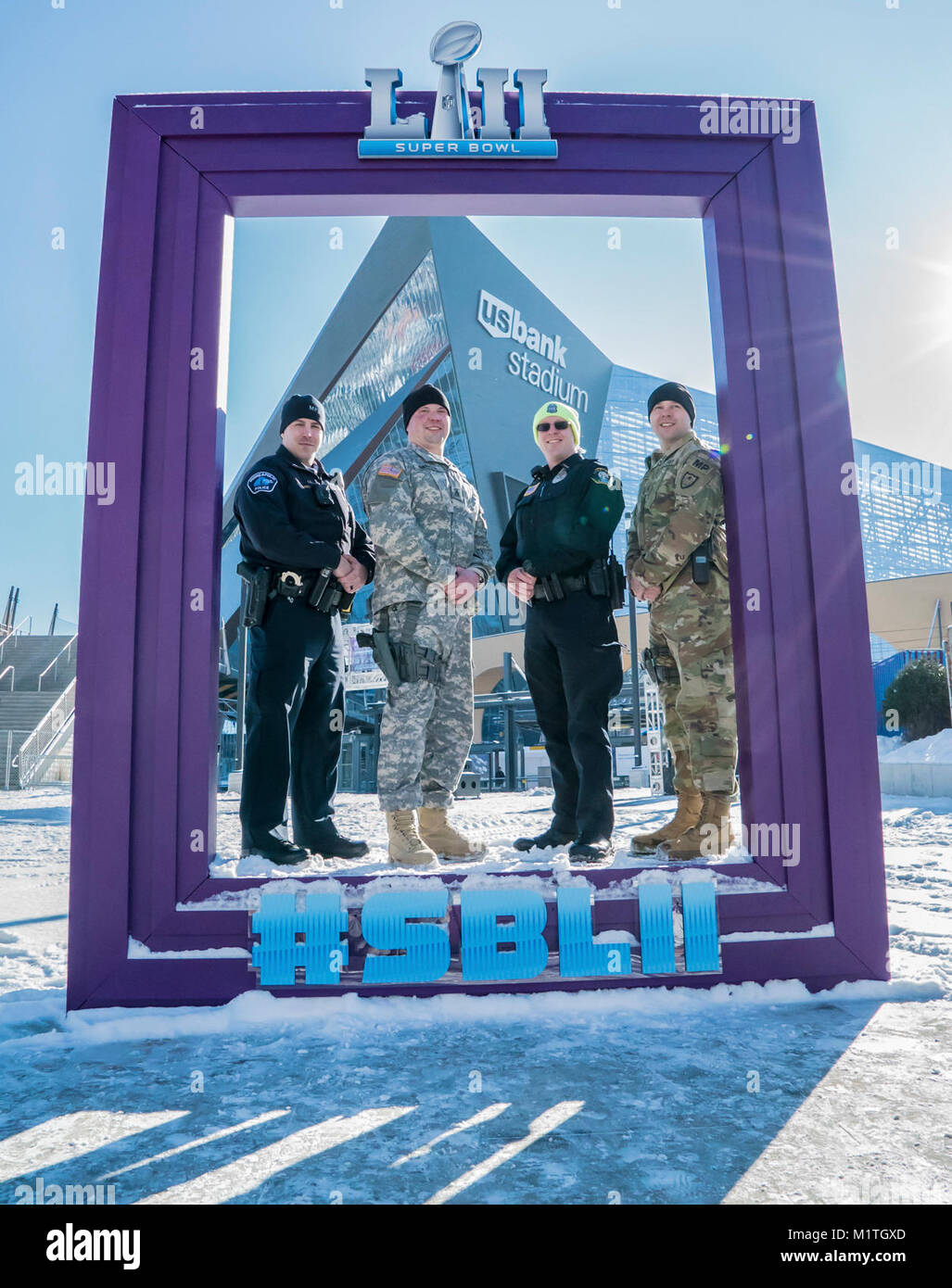 Minnesota police officers and Minnesota National Guard Soldiers take ...