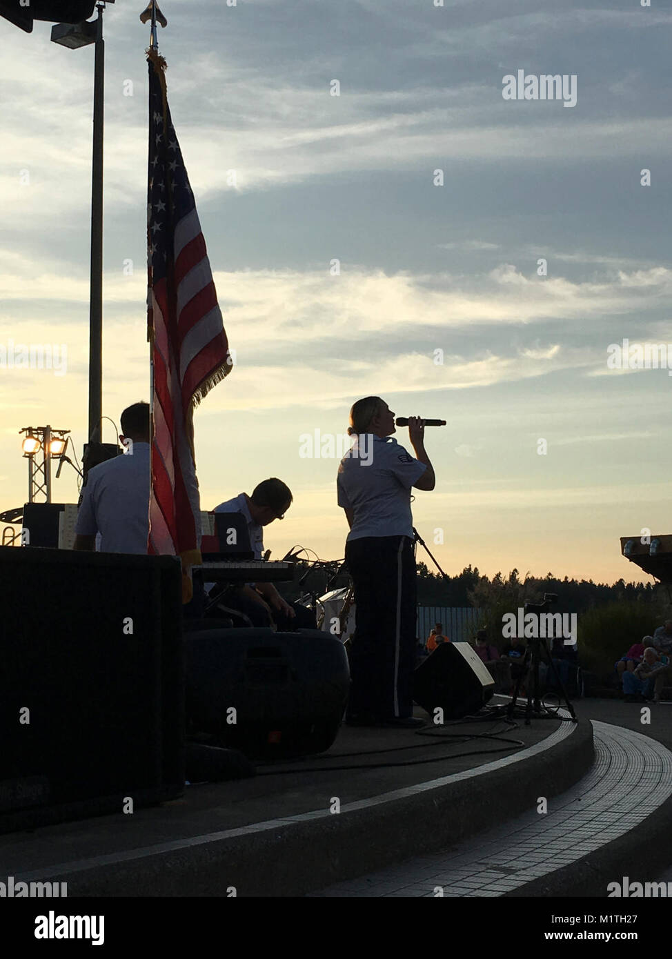 U.S. Air Force Senior Airman Stephanie Allen sings for an enthusiastic ...