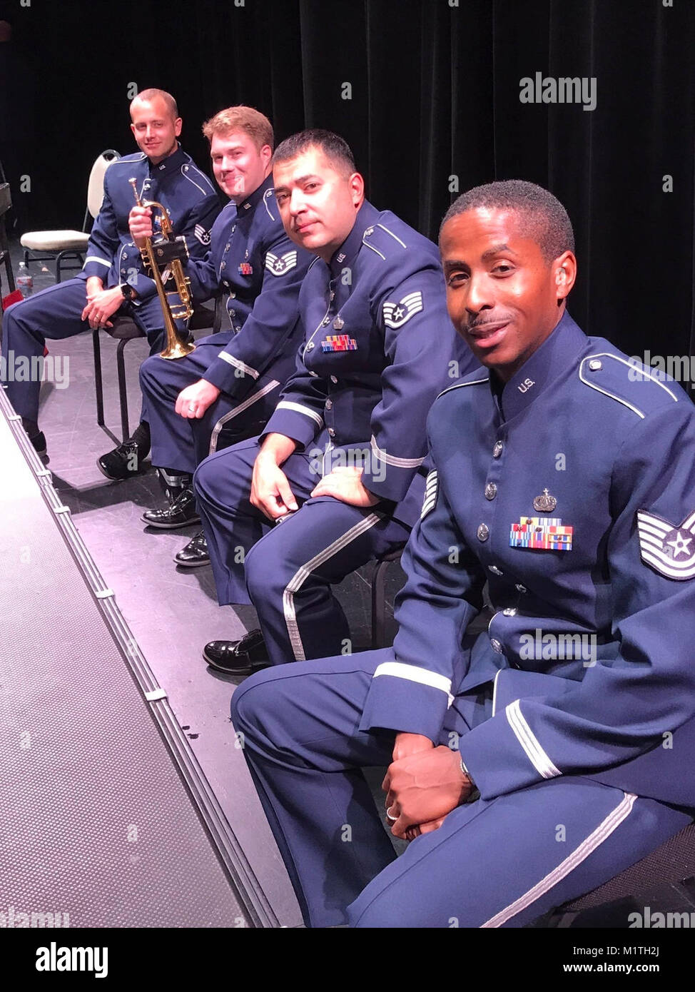 The trumpet section poses for a picture before final concert with The ...