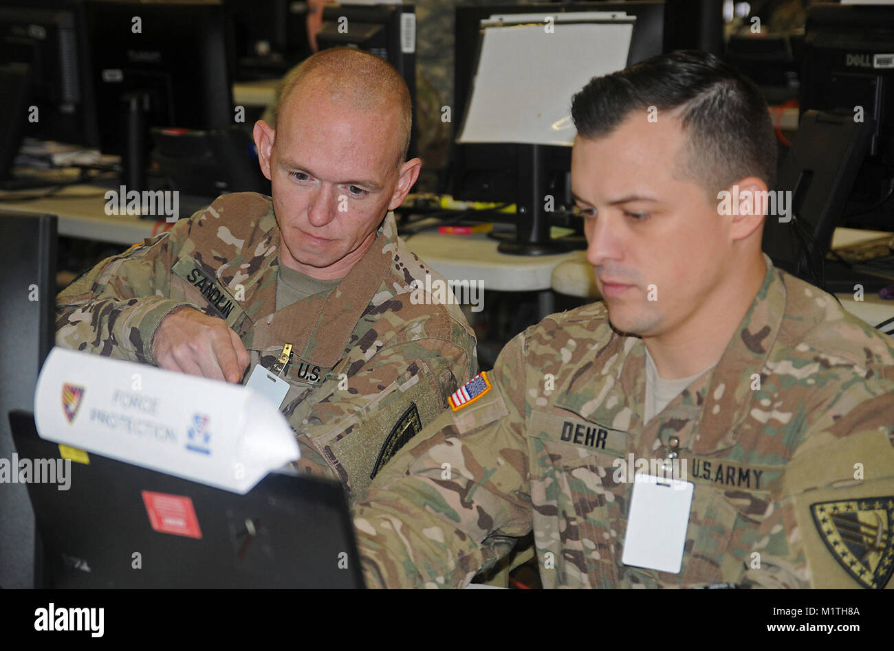 Sgt. Charles Sandlin and 1st Lt. Alexander Dehr of the Indiana National ...