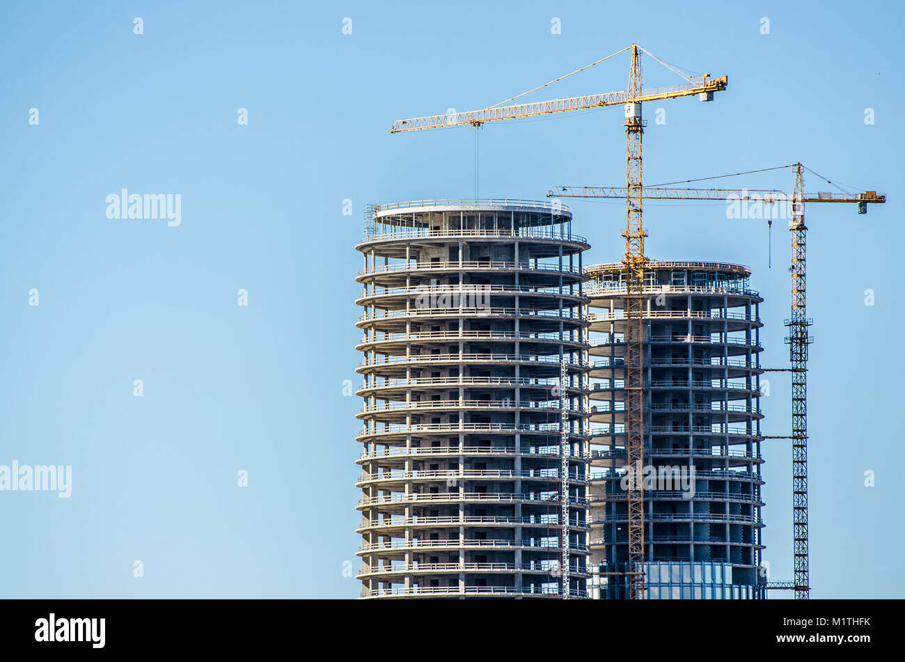 New buildings being constructed. Industrial building site. Shot of two ...