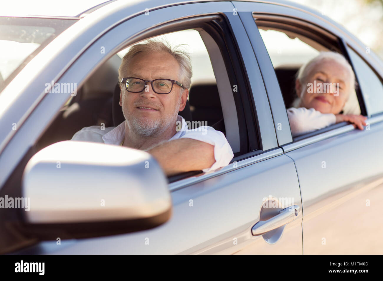 happy senior couple driving in car Stock Photo - Alamy