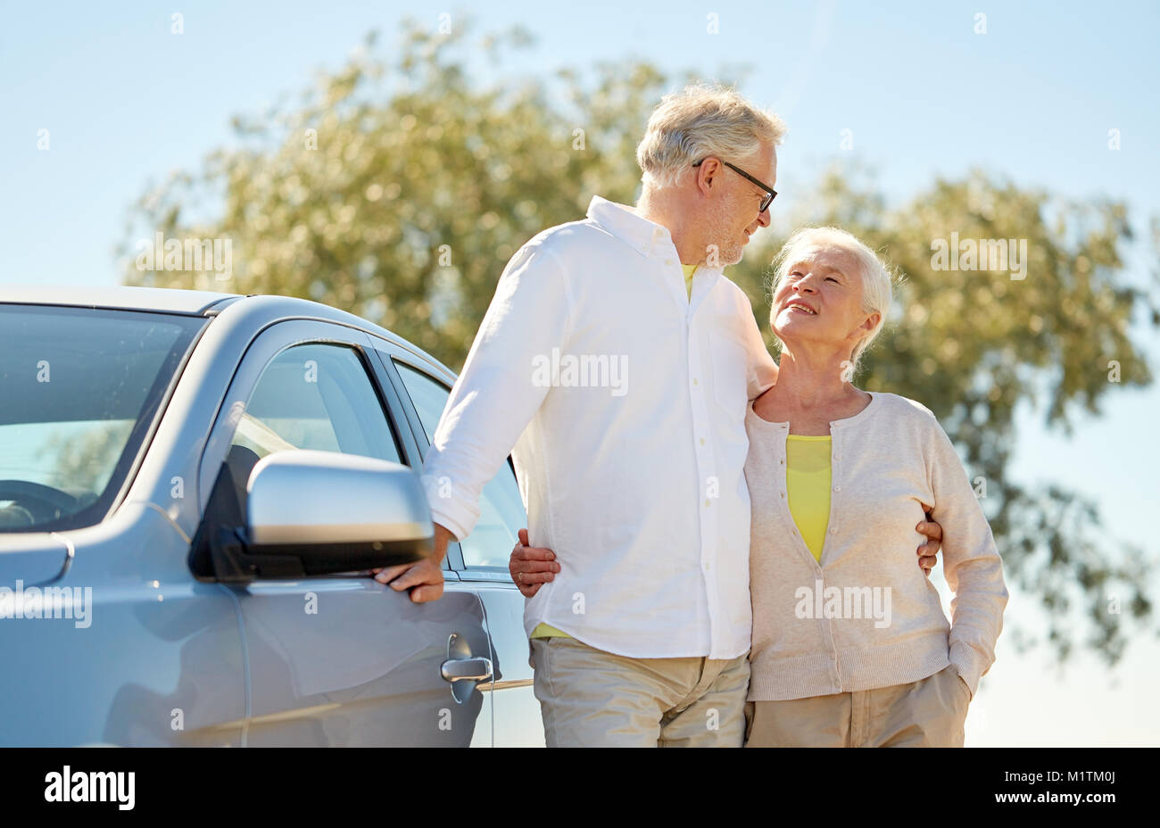 happy senior couple at car in summer Stock Photo - Alamy