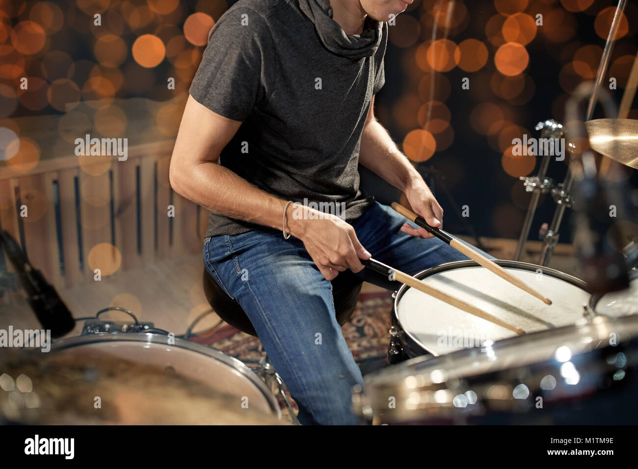 musician or drummer playing drum kit at concert Stock Photo - Alamy