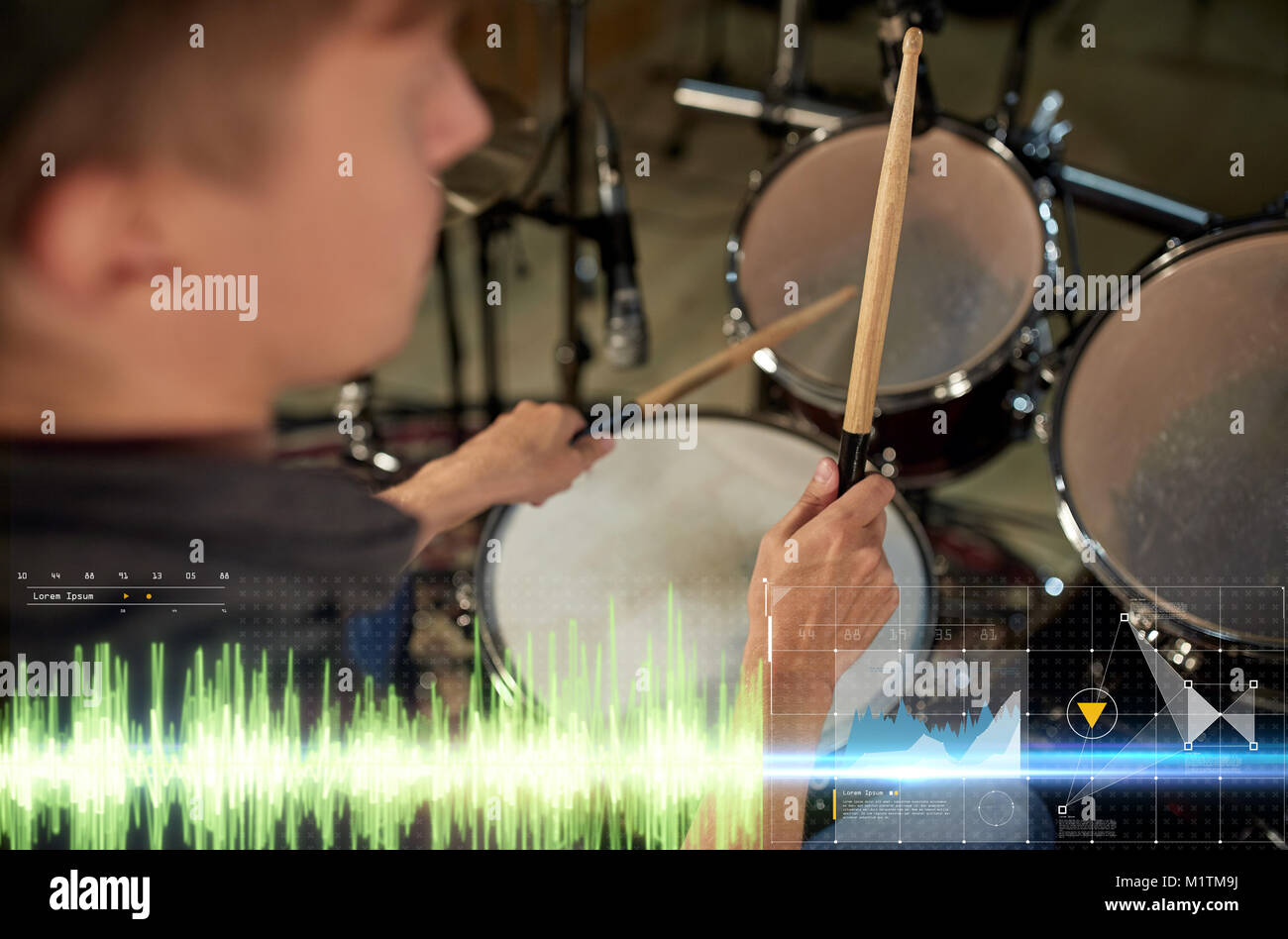 male musician playing drum kit at concert Stock Photo - Alamy