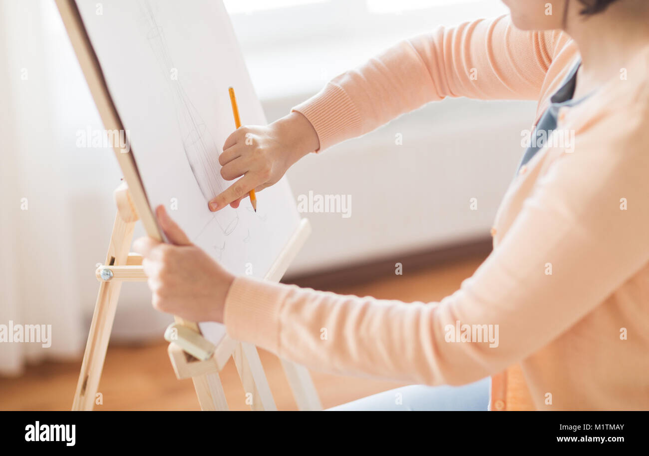 artist with pencil drawing picture at art studio Stock Photo - Alamy