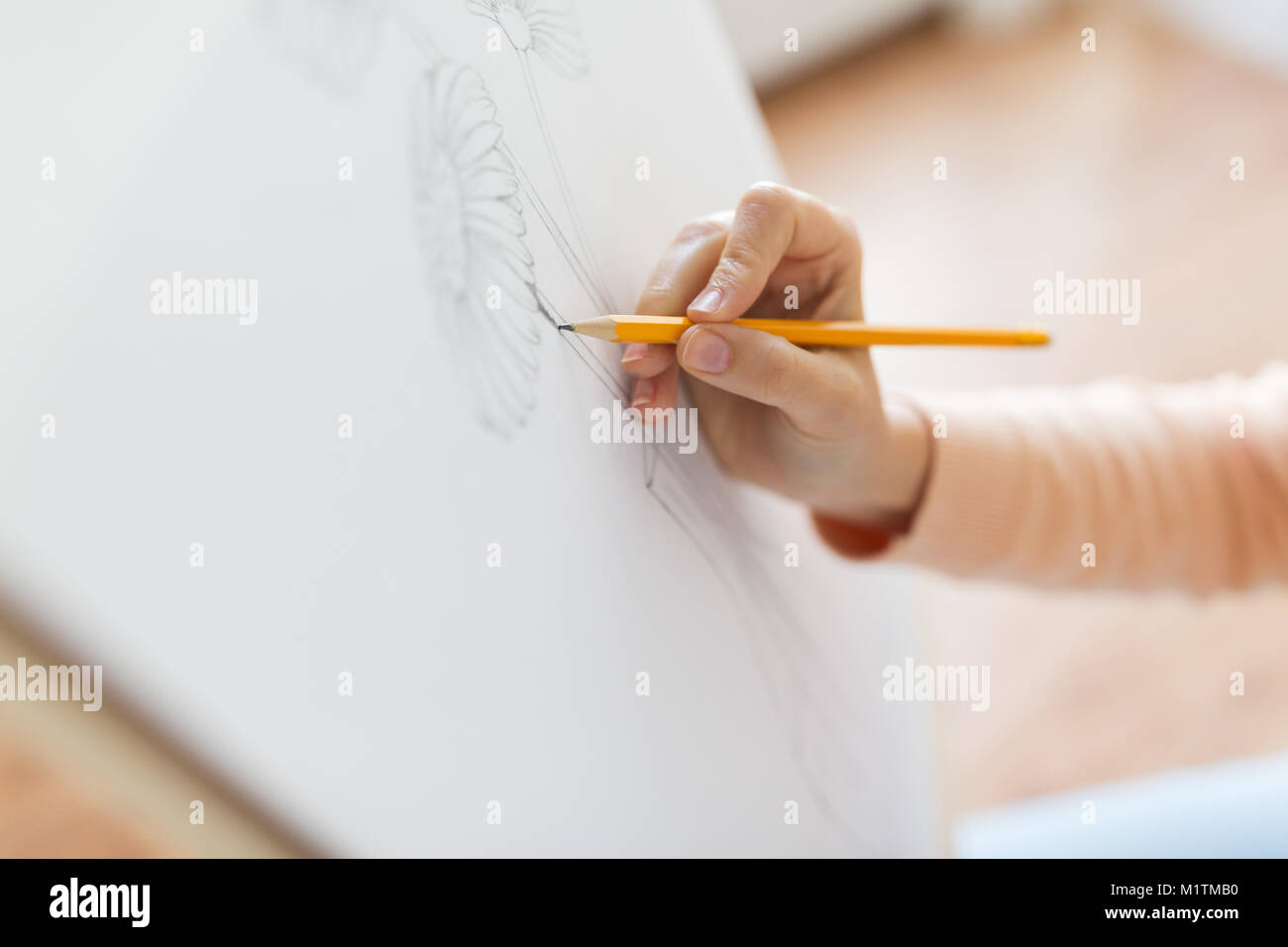 artist with pencil drawing picture at art studio Stock Photo - Alamy