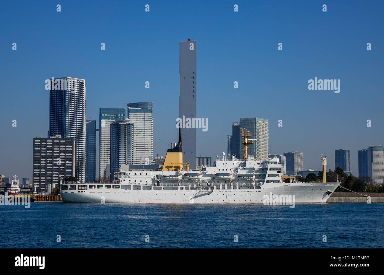 Tokyo, Japan - Jan 4, 2016. A ferry docking on Tokyo Bay, Japan. The ...
