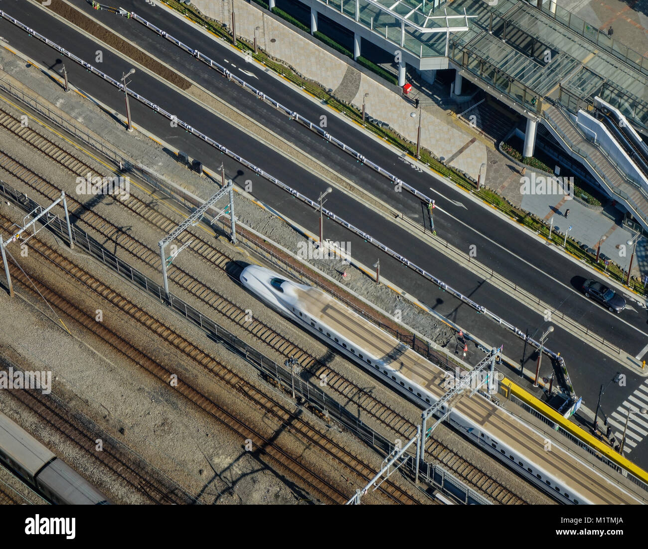 Aerial view of JR rail tracks in Tokyo, Japan. A Shinkansen coming to ...