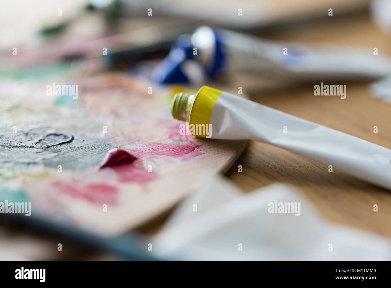 acrylic color or paint tubes and palette Stock Photo - Alamy