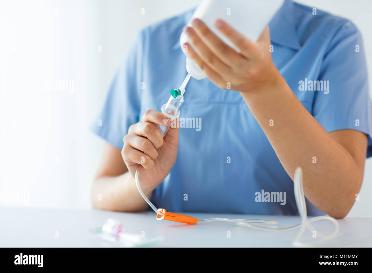 close up of nurse preparing drop counter Stock Photo - Alamy