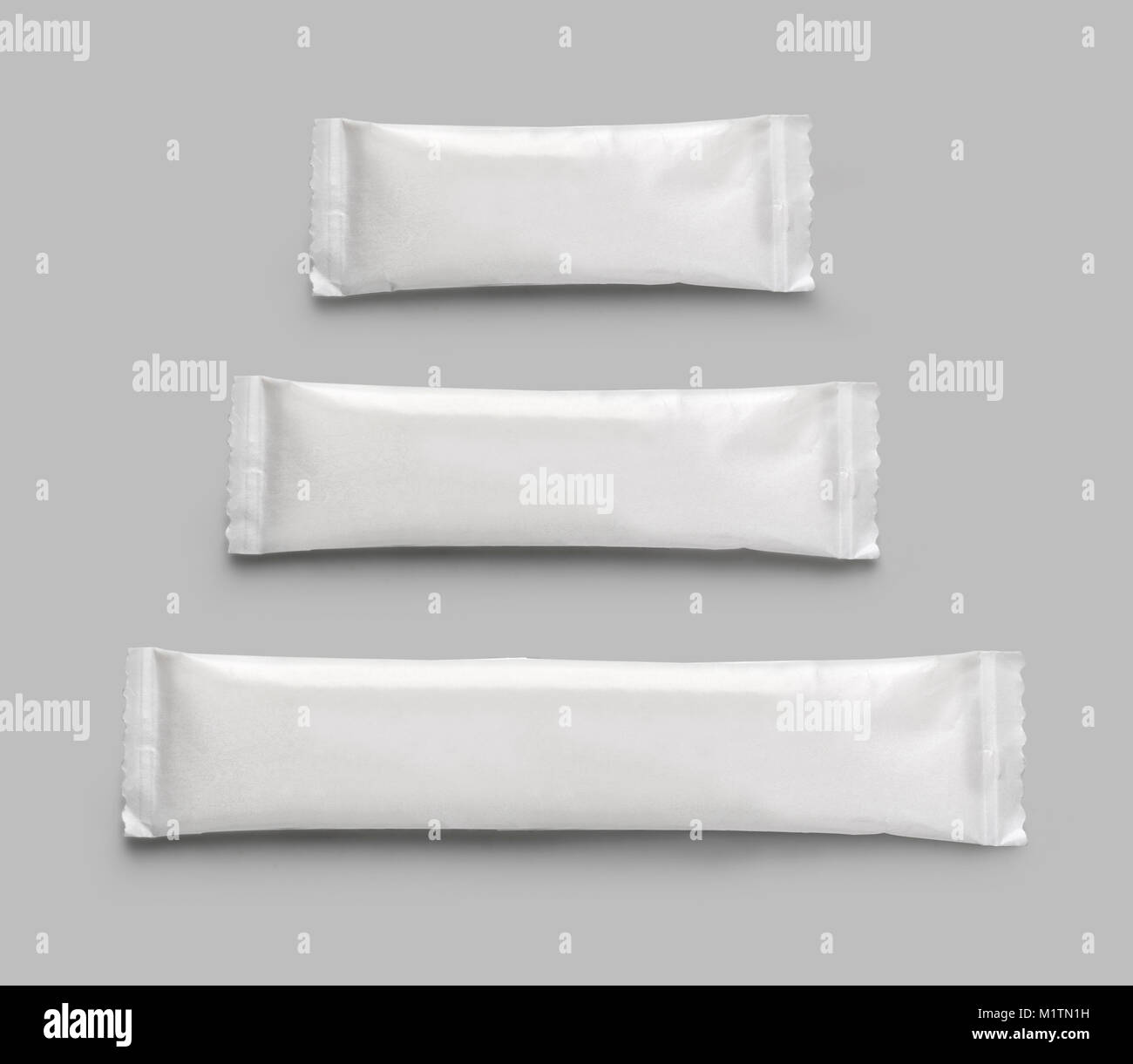 White paper sachet bag for coffee, sugar, salt, pepper on white ...