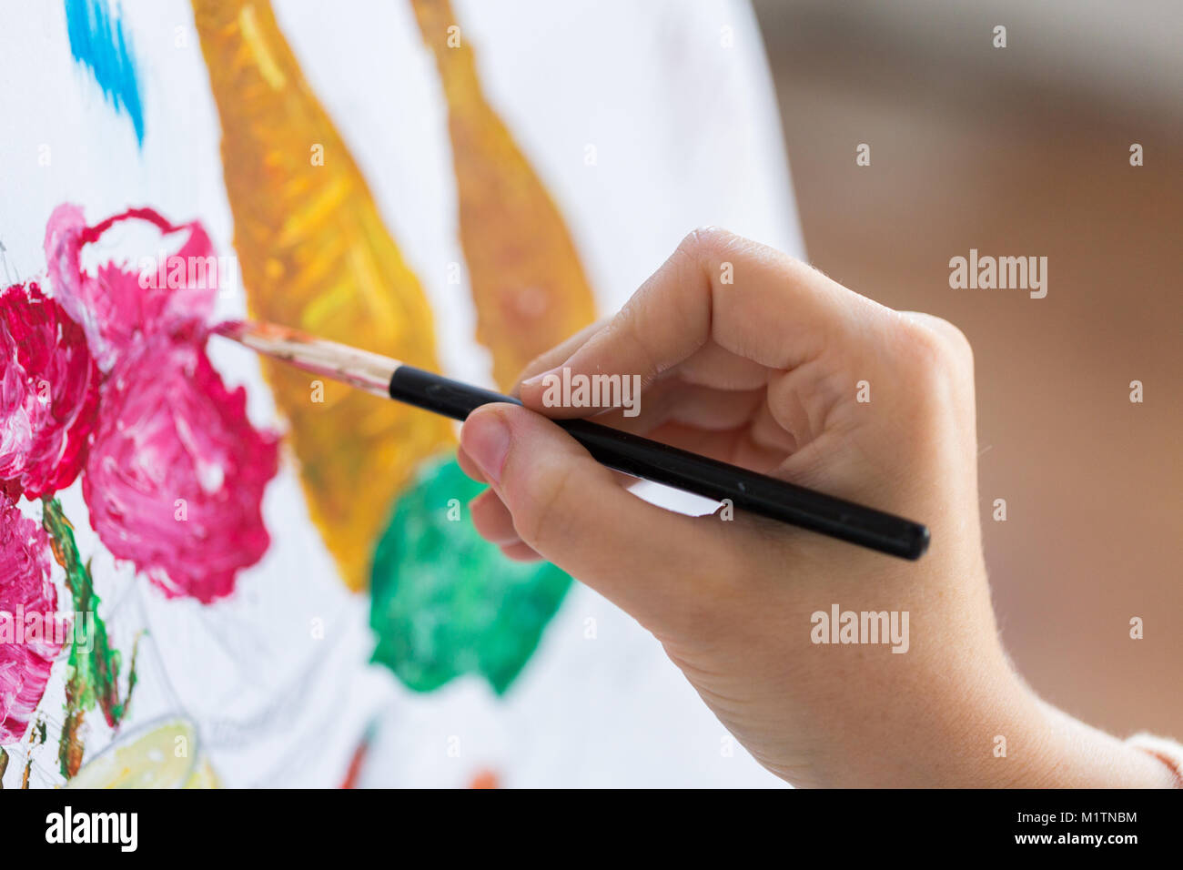 artist with brush painting still life picture Stock Photo - Alamy