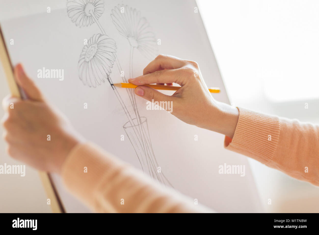 artist with pencil drawing picture at art studio Stock Photo - Alamy