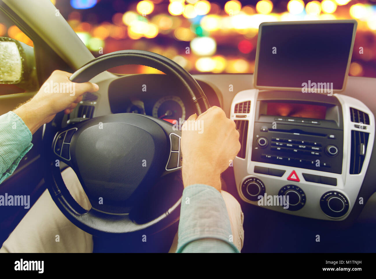 close up of young man with tablet pc driving car Stock Photo - Alamy
