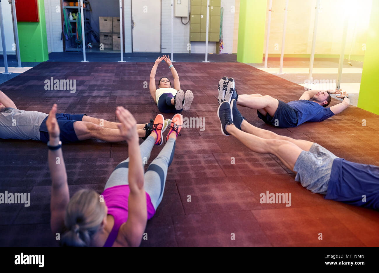 group of people exercising in gym Stock Photo - Alamy