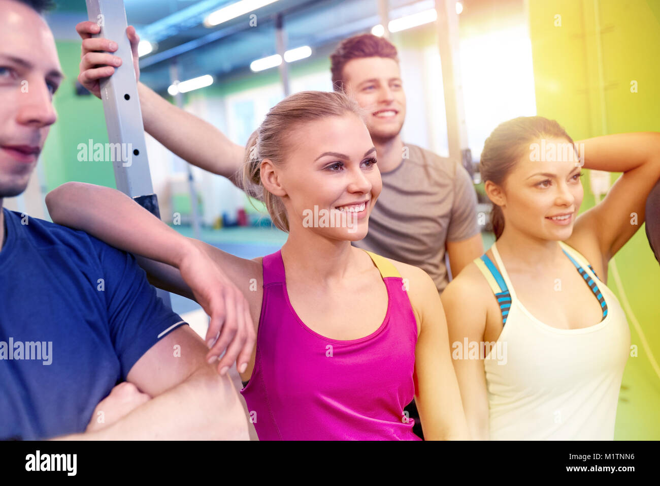 group of happy friends in gym Stock Photo - Alamy