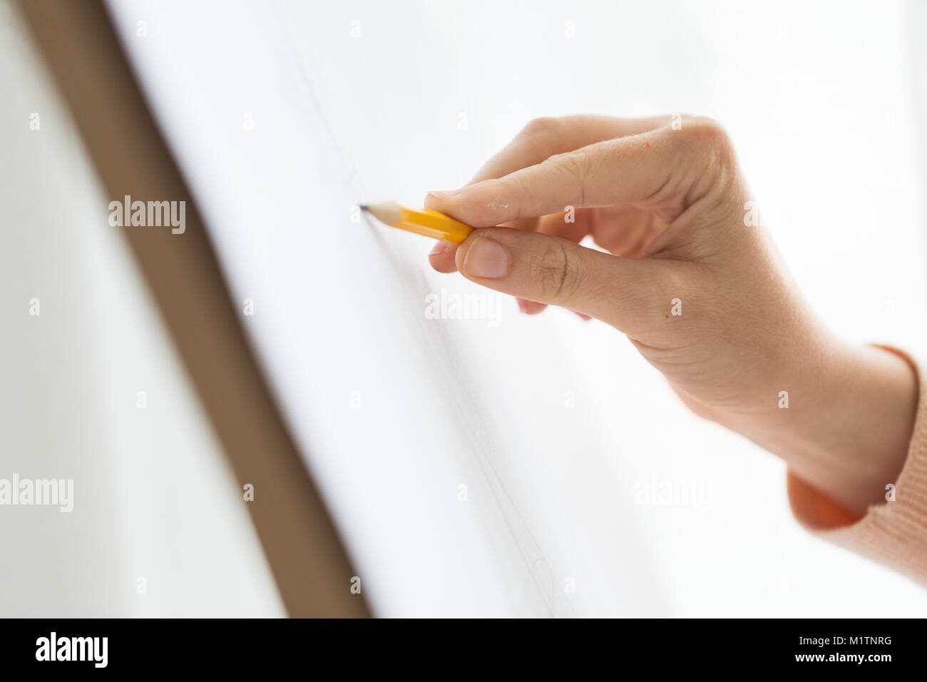artist with pencil drawing picture at art studio Stock Photo - Alamy