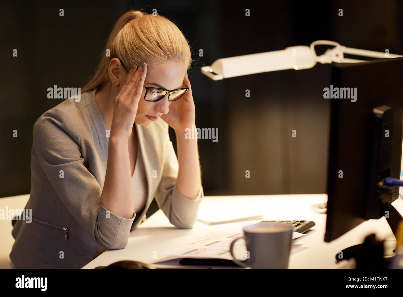 businesswoman at computer working at night office Stock Photo - Alamy