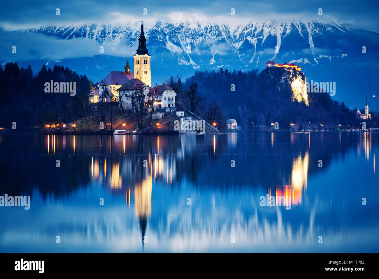 night scenery at Bled lake with church on island . Dramatic ...