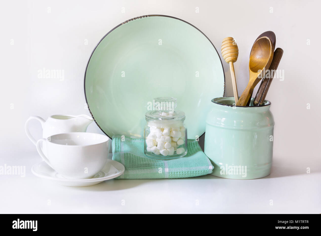 Crockery, tableware, utensils and other different white and turquoise ...