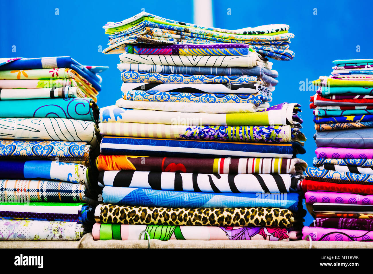 A stack of folded colored tissue Stock Photo - Alamy