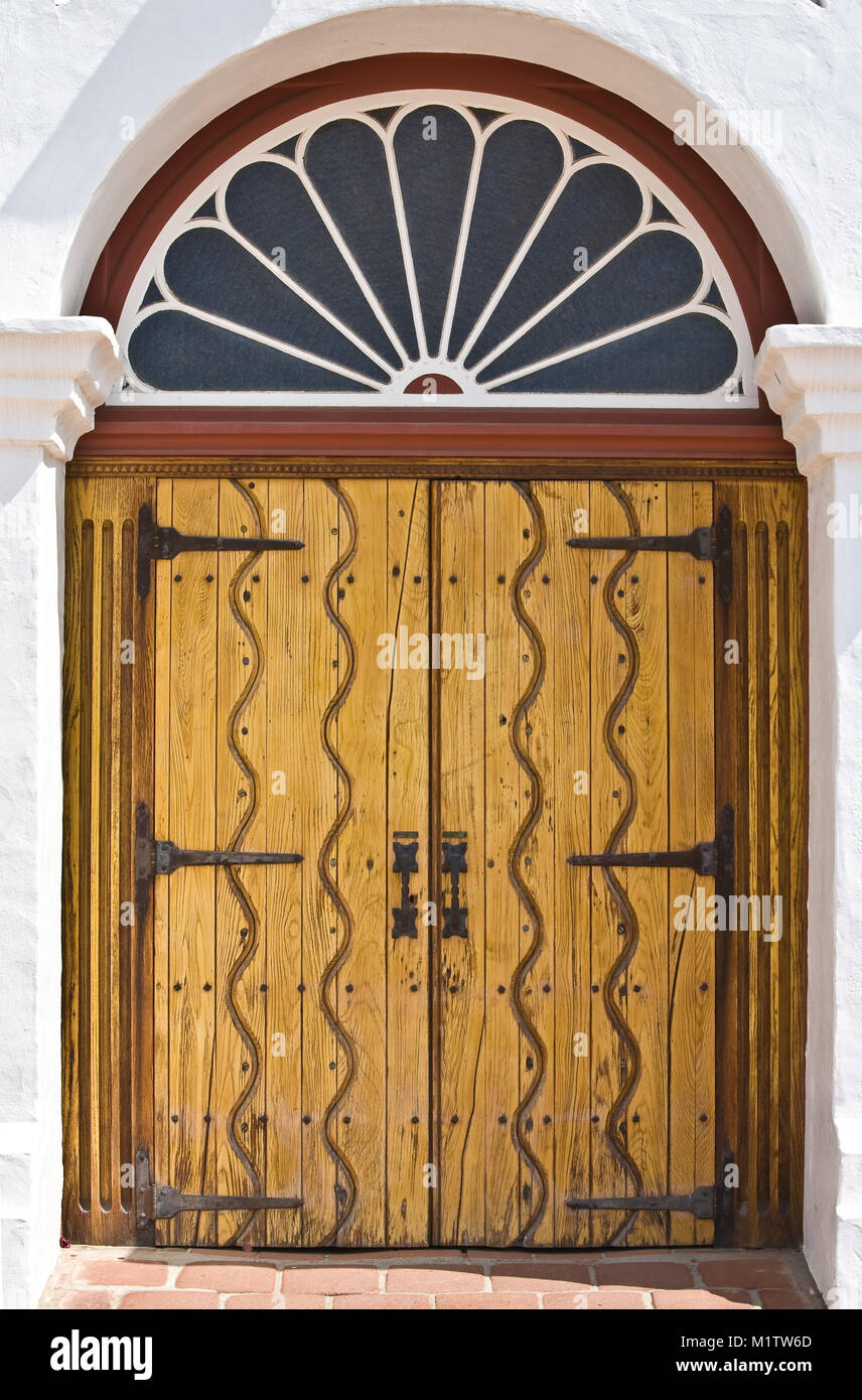 Elaborate vintage wooden doors on the grounds of Mission San Luis Rey ...