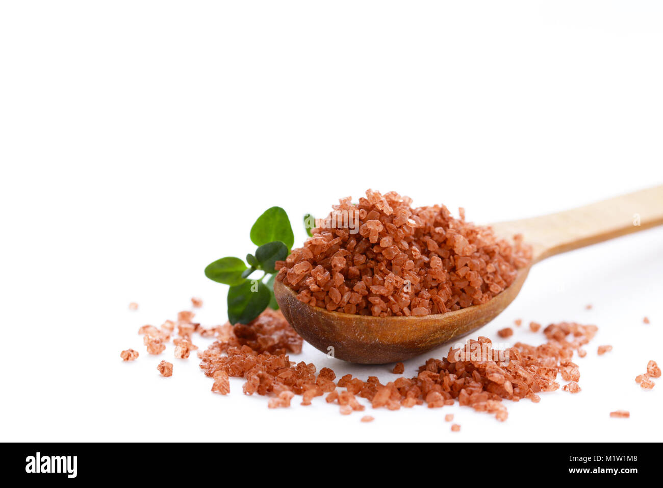 gourmet salt - red Hawaiian variety in a spoon on a white background ...