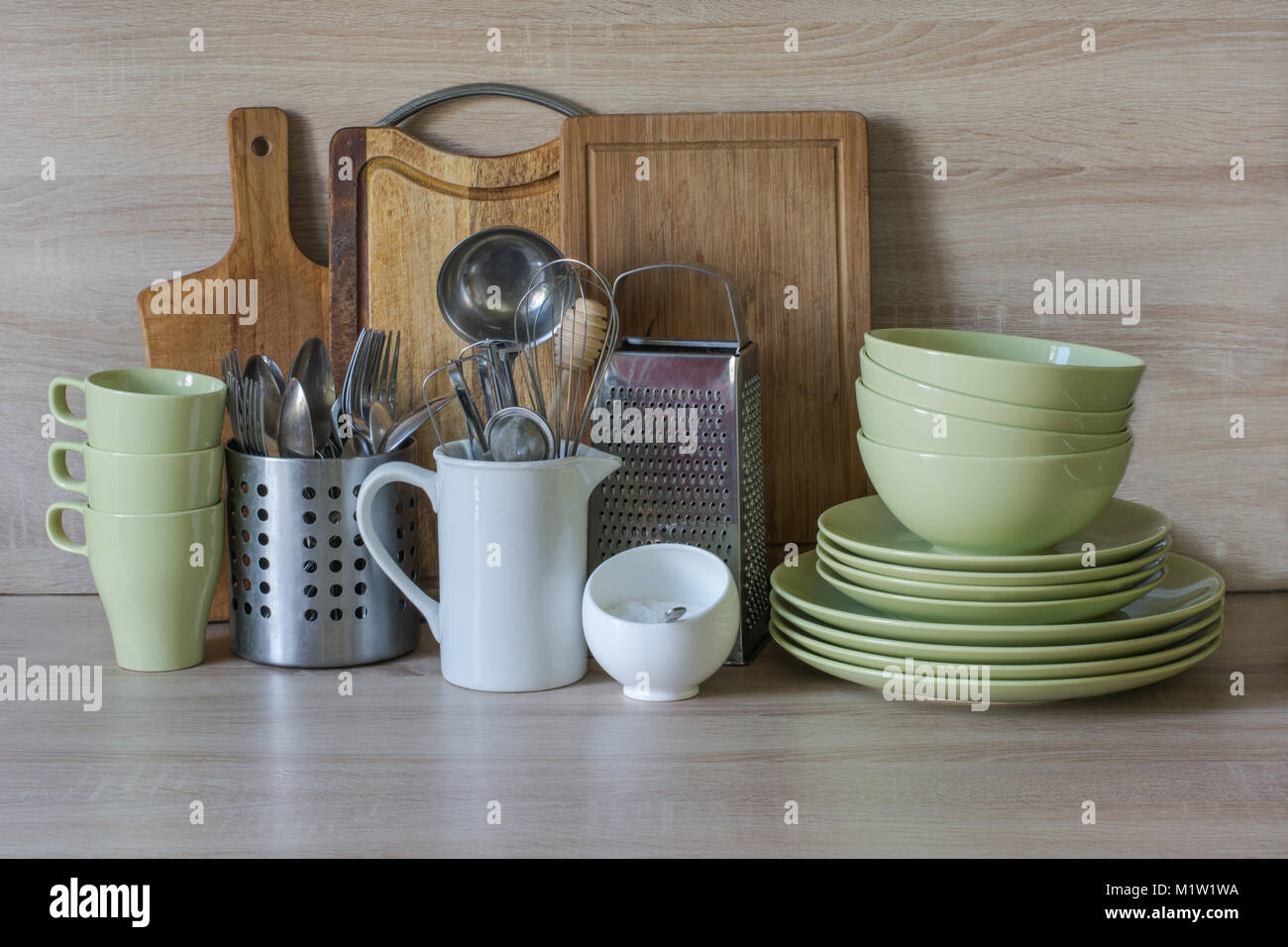 Kitchen still life as background for design. Crockery, tableware and ...