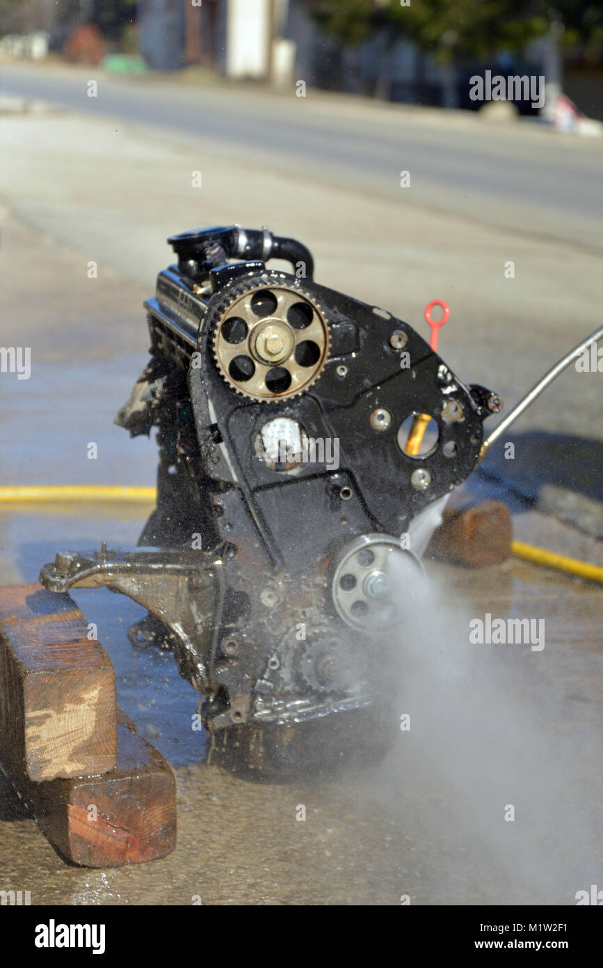 cleaning the old car engine with hot pressurized water ,image of a ...